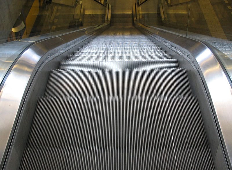 NY Woman Injured after Hair Becomes Trapped in Escalator Stairs - Law ...